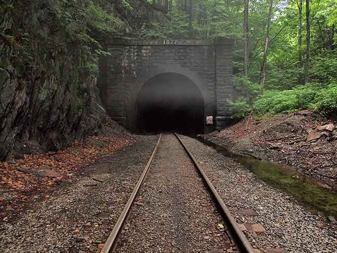 That 1877 date carved in stone isn't just decoration, it's a monument to two decades of determination and tragedy.
