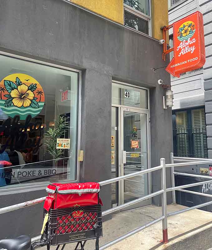 That bright orange sign isn't just decoration, it's a beacon calling you to Hawaiian paradise in Brooklyn.