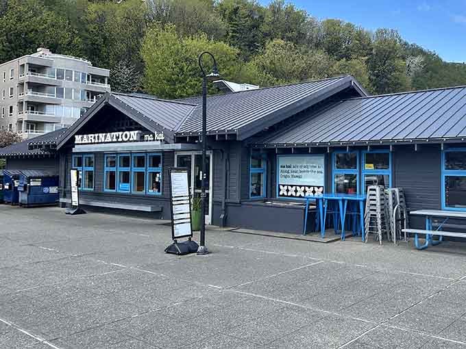 The blue-trimmed exterior of Marination Ma Kai practically screams "beach vibes," even when Seattle's clouds have other ideas.