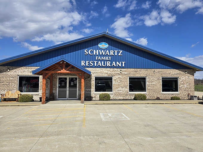 That blue roof against the sky signals your arrival at comfort food paradise in rural Indiana.