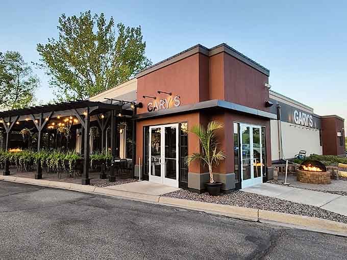The inviting entrance and outdoor patio promise good times ahead, where comfort food meets genuine Midwest hospitality every single night.
