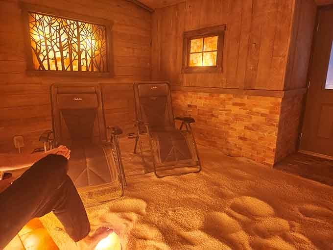 Those zero-gravity chairs and glowing amber walls create a sanctuary that looks like a spa designed by Mother Nature herself.