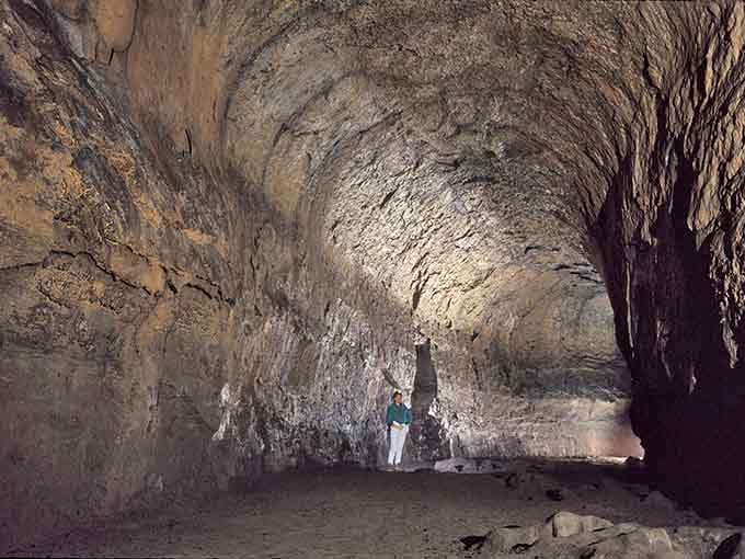 The cathedral-like interior reveals nature's architectural genius, carved by molten rock hundreds of thousands of years ago.