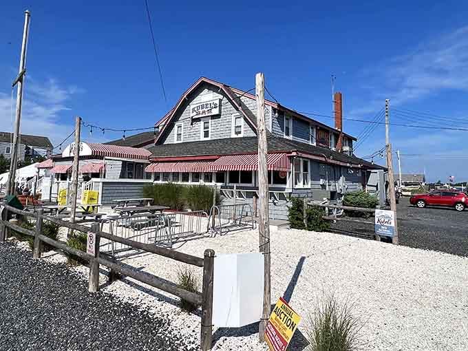 That classic red and white striped awning isn't just decoration, it's a beacon calling hungry souls home to Barnegat Light's beloved seafood institution.