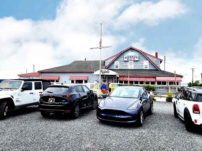 That classic red and white striped awning isn't just decoration, it's a beacon calling hungry souls home to Barnegat Light's beloved seafood institution.