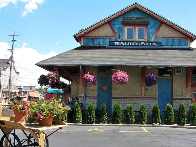 When a historic train depot gets a vibrant makeover, hanging baskets and all, you know something special awaits inside.