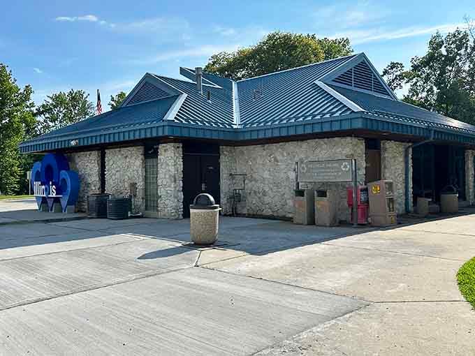 Stone pillars and modern architecture make this highway stop look more like a boutique lodge than a bathroom break.