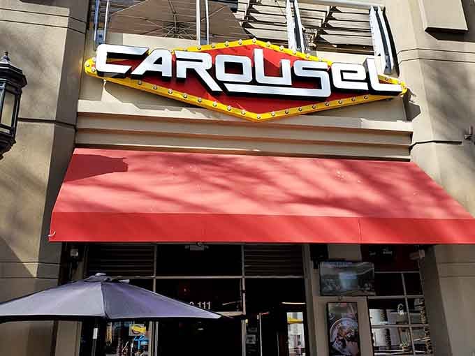 That retro-futuristic sign isn't just calling you in, it's practically begging you to relive your glory days.