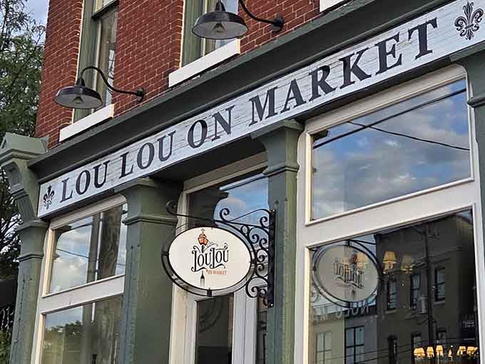 That fleur-de-lis on the sign isn't just decoration, it's a promise of authentic Louisiana flavors waiting inside.