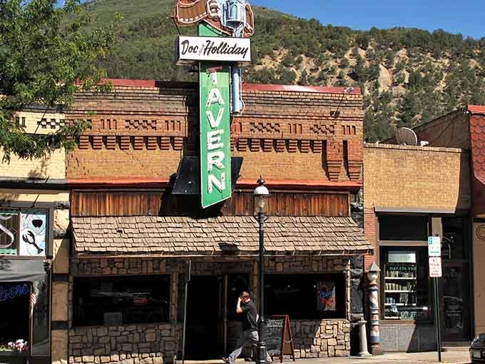 That vintage sign towers over downtown Glenwood Springs like a beacon calling hungry travelers to their destiny.