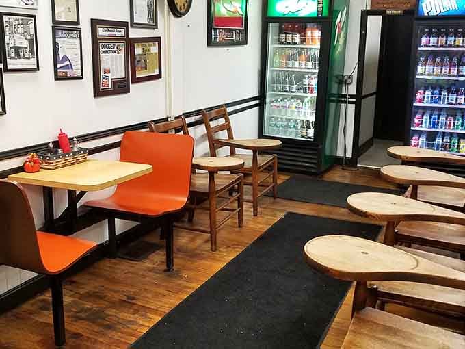 Simple seating, legendary sauce, and a century of hot dog wisdom all under one roof.