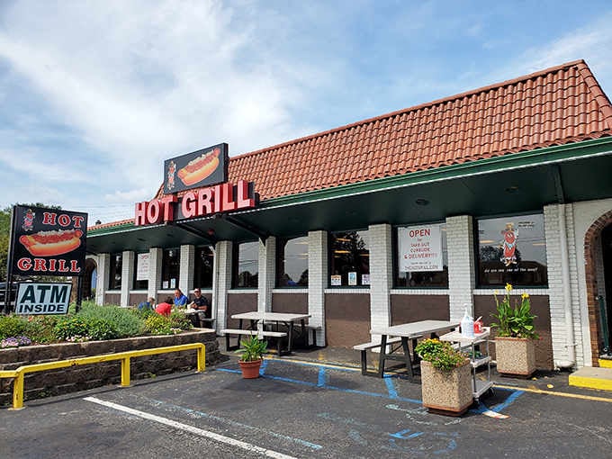 That orange-tiled roof isn't just architecture&mdash;it's a beacon guiding hungry souls to hot dog salvation for six decades.