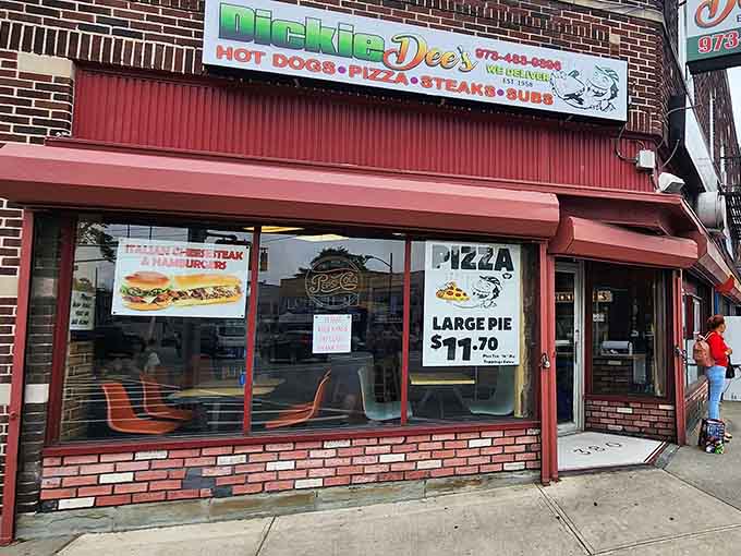 That classic red awning beckons like a beacon of deliciousness, promising sixty years of unchanged perfection inside.