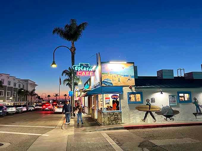 That vintage neon sign and beach mural aren't just decoration&mdash;they're a beacon calling hungry souls to chowder paradise.