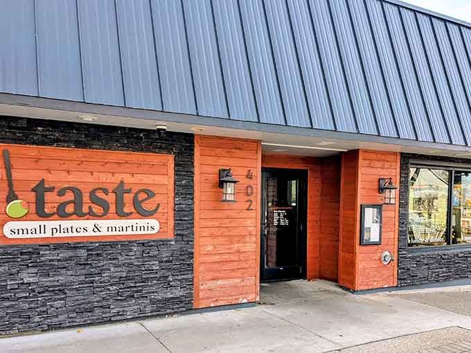 That vibrant orange exterior isn't just eye-catching, it's practically demanding you come inside and eat something delicious.