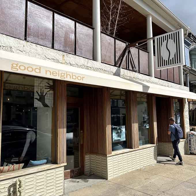 The two-story facade with that distinctive spoon logo proves good design doesn't need to shout to get your attention.