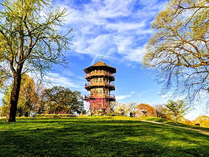 This tiered tower stands like a layer cake for the soul, framed by fall foliage that would make even your screensaver jealous.
