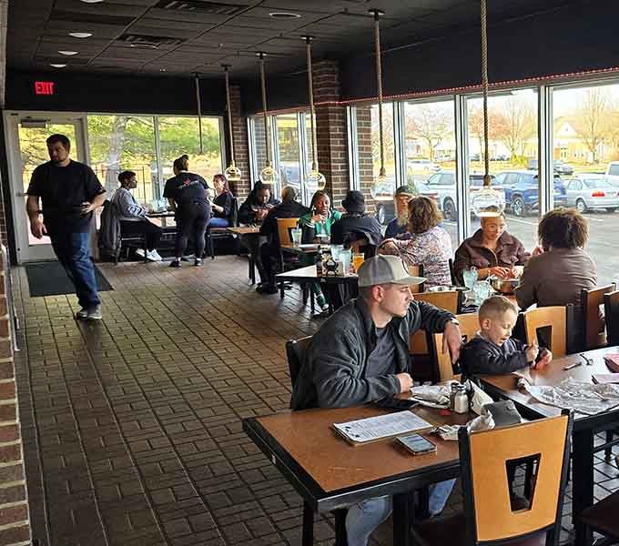 The dining room buzzes with the kind of energy that only comes from people eating really, really well.
