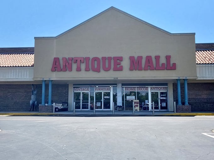 That pink "ANTIQUE MALL" sign isn't subtle, and honestly, subtlety is overrated when treasure hunting's involved.