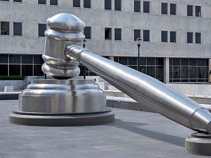 That gleaming metallic giant isn't compensating for anything, it's just making a very large point about justice.