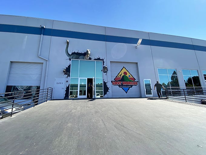 That dinosaur bursting through the entrance isn't just decoration, it's a promise of the adventure waiting inside.