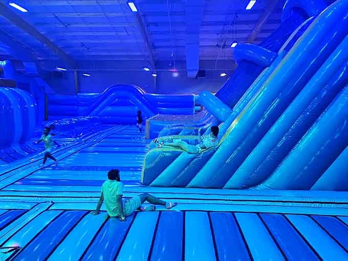 That ethereal blue glow isn't just mood lighting, it's your invitation to bounce like physics doesn't apply anymore.