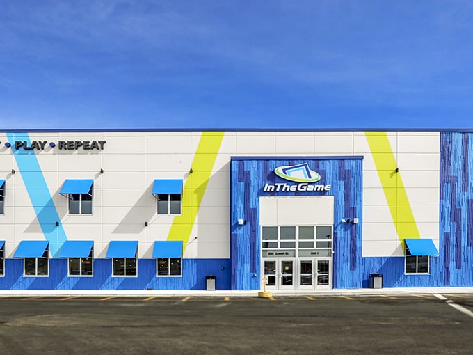 Sunshine and bright awnings frame the doorway to unlimited game play and good times inside.