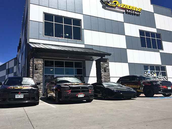 The modern exterior promises high-speed thrills inside, where weather never cancels your racing plans.