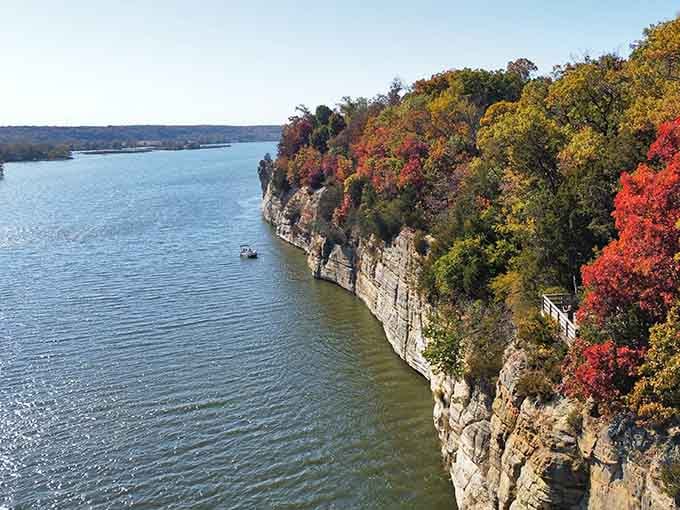 Fiery fall foliage meets ancient rock formations in a view that'll make you forget about cornfields entirely.