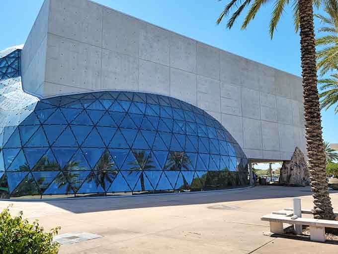 The Enigma dome gleams under Florida sunshine like a giant crystal that decided geometry was its calling.