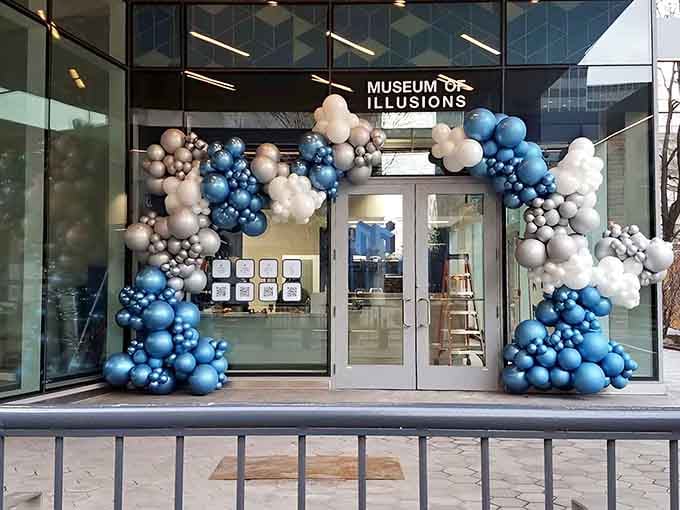 Even the entrance knows how to make a statement with those balloon arches and glowing letters screaming "fun ahead."
