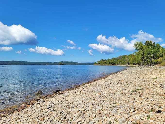 That pebble beach meets water so clear you'll wonder if someone installed a filtration system overnight.