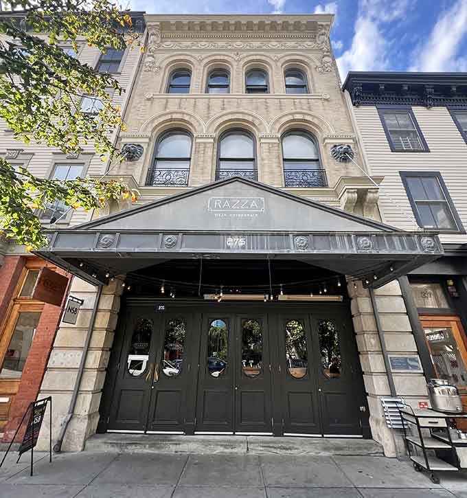 Those dark green doors have welcomed more pizza pilgrims than you can count, and for good reason.