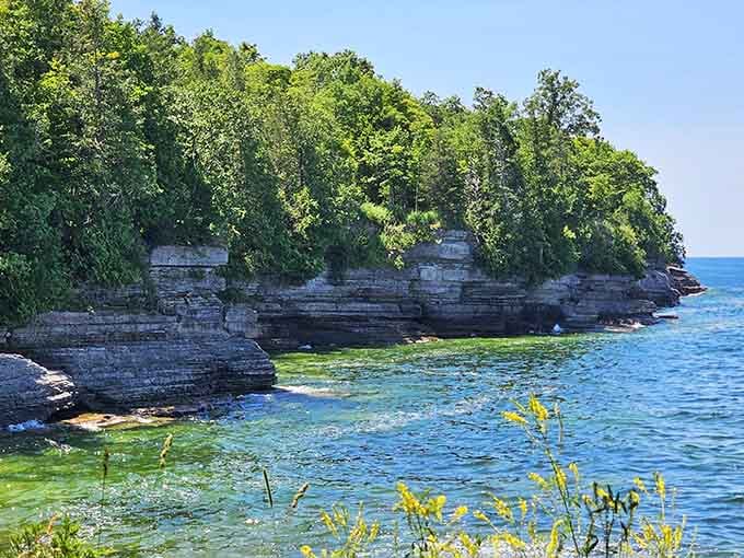 Those limestone cliffs rising from Lake Ontario's turquoise waters look like nature's own castle walls.