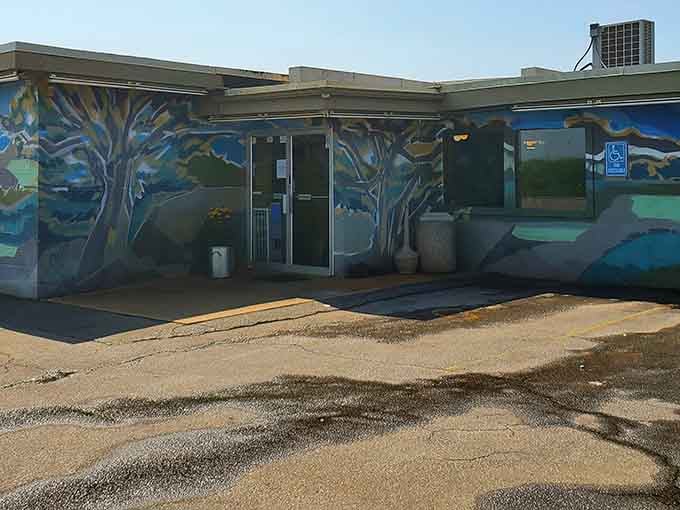 That mural isn't just decoration, it's a promise that something special awaits inside this Madison barbecue sanctuary.