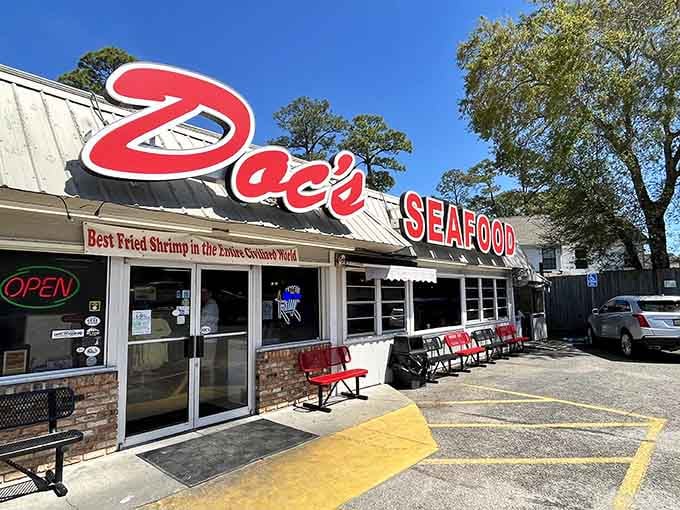 That unassuming white building with the bold red "SEAFOOD" sign is your gateway to fried shrimp paradise.