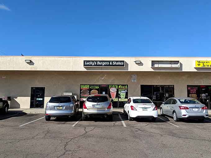 That blue sign isn't just marking a location, it's pointing you toward burger enlightenment in Phoenix.