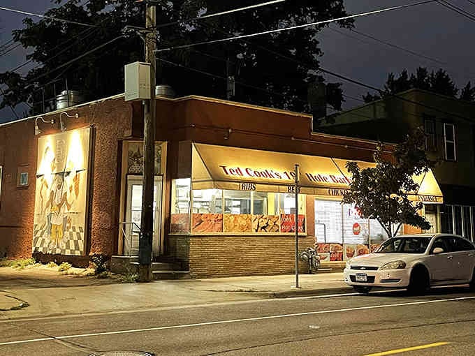 That corner glow means someone inside is doing something very right with smoke and fire.