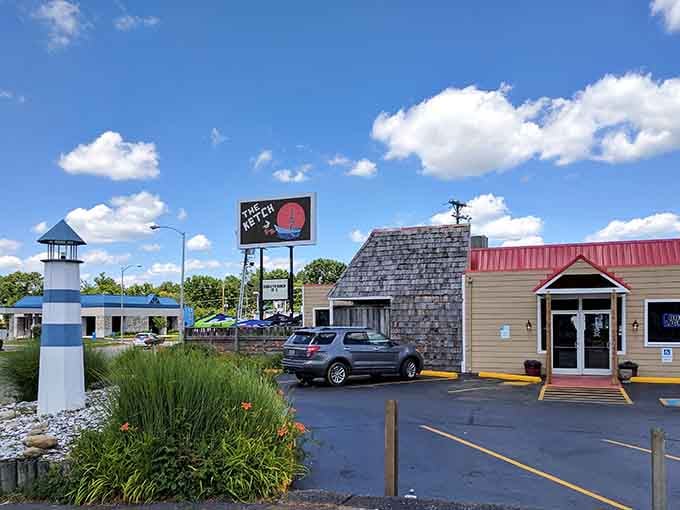 That striped lighthouse isn't just for show, it's your beacon guiding you to seafood paradise in the Bluegrass State.