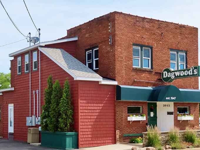The brick facade and green awning signal you've arrived at burger paradise in Lansing, Michigan.