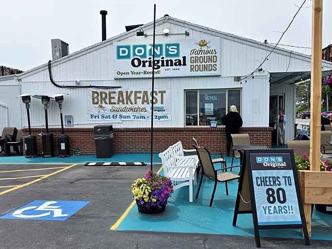 That classic white exterior with bright blue lettering isn't trying to impress anyone, just feed them brilliantly.