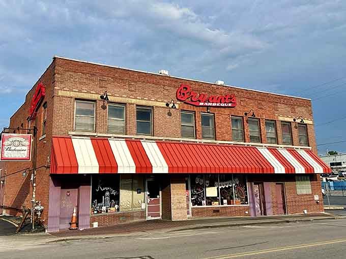 That striped awning and neon sign aren't trying to impress anyone &ndash; they're just marking barbecue greatness.