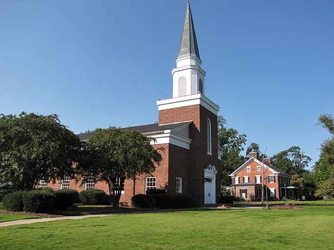 Classic red brick and Southern charm meet under Carolina blue skies in this timeless downtown scene.