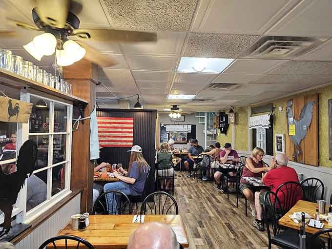 Inside, wooden tables and ceiling fans set the stage for serious eating in a space that feels refreshingly unpretentious.