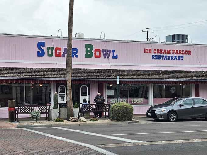 That pink facade isn't whispering nostalgia, it's shouting it from the rooftops of Scottsdale Road with pride.
