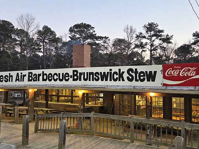That sign isn't just advertising; it's a beacon of hope for anyone within a fifty-mile radius who values real barbecue.