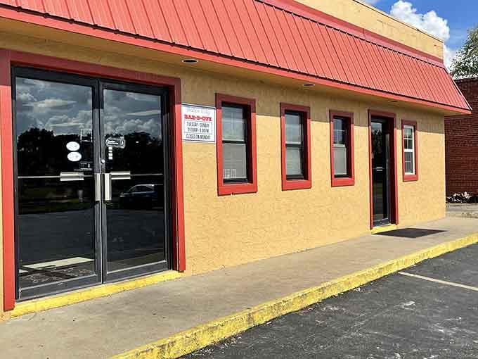 That red metal roof isn't just for show, it's your beacon to barbecue paradise in tiny Bates City.