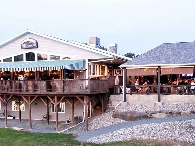 That multi-level deck overlooking the water isn't just for show, it's where steak dreams come true every evening.