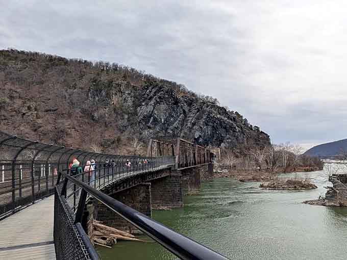 This footbridge over the Potomac is your victory lap, carrying tired legs into Harpers Ferry's welcoming embrace.