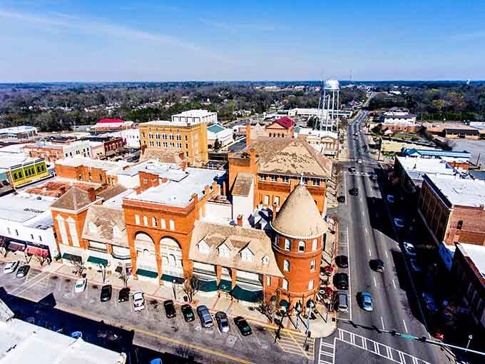 From above, this historic downtown reveals its architectural treasures like a perfectly preserved time capsule with modern conveniences.